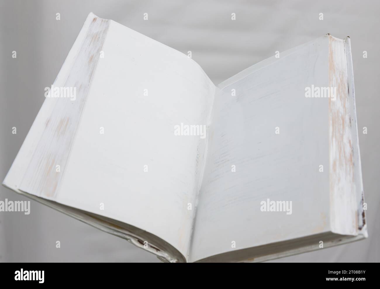 blank white open book on a uniform backgroundblank white open book on a ...