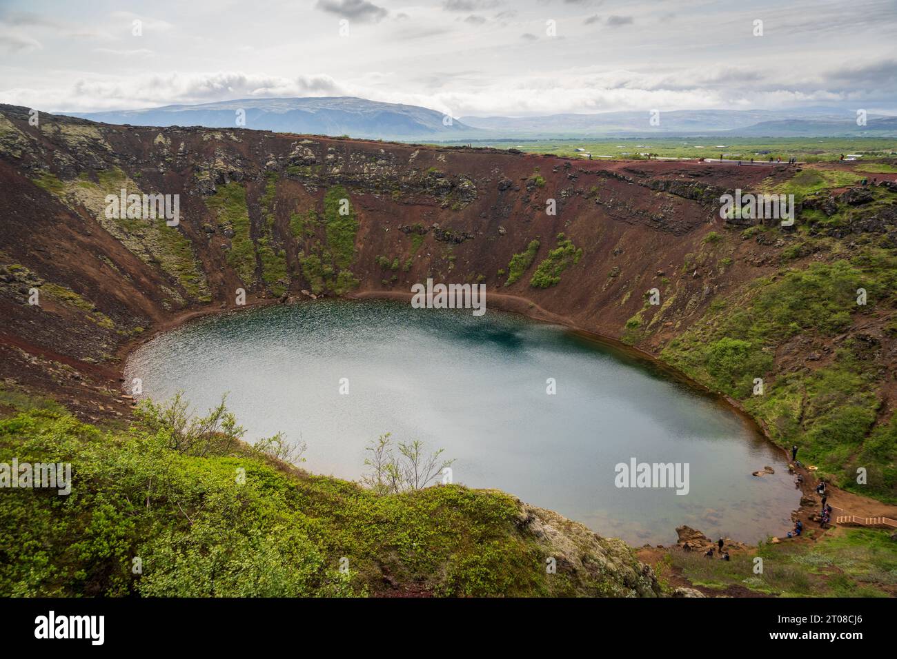 The Kerið is a volcanic crater lake in Iceland During a Summer Day ...