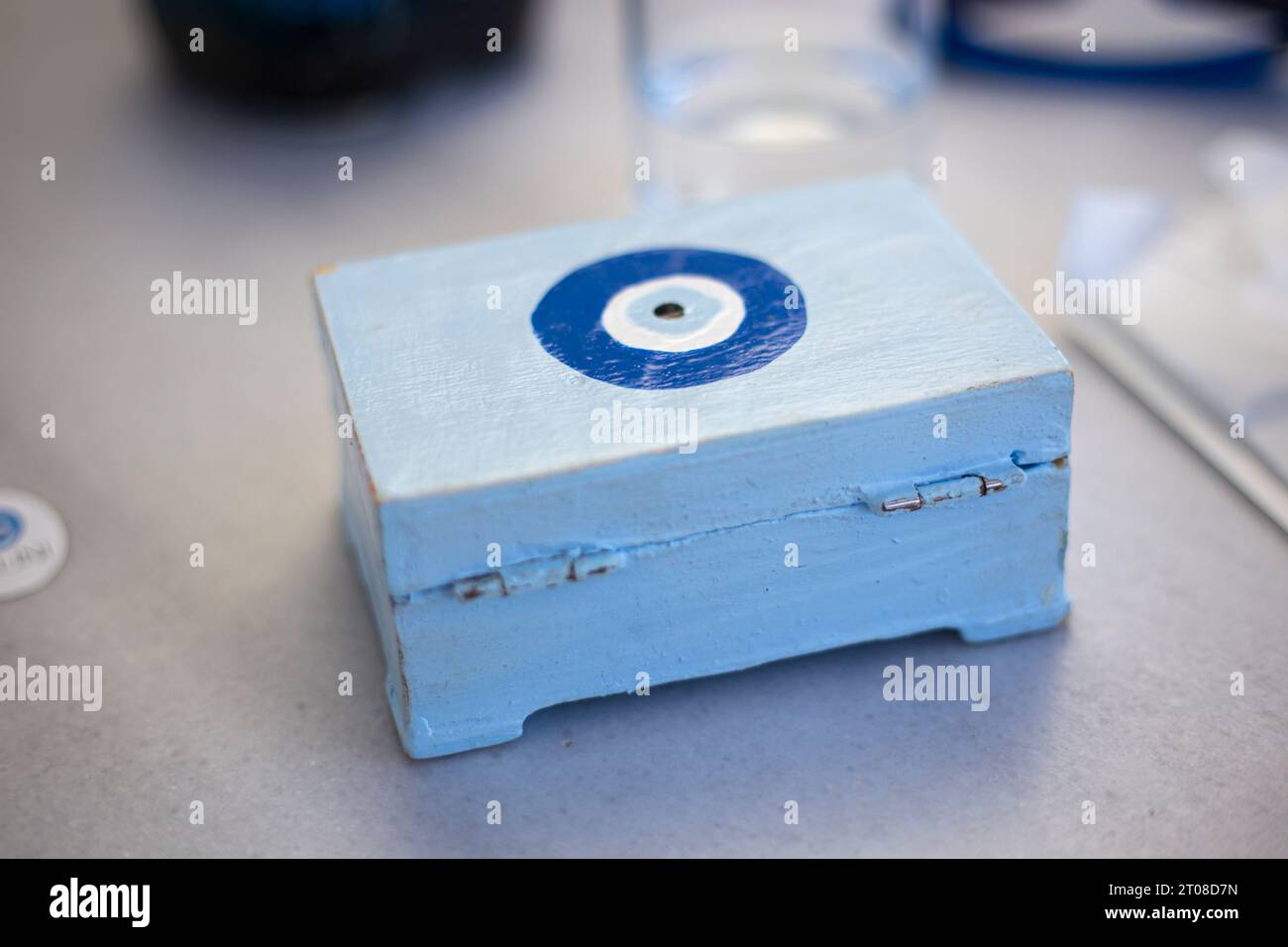 Blue wooden secret treasury box with blue magic eye Stock Photo - Alamy