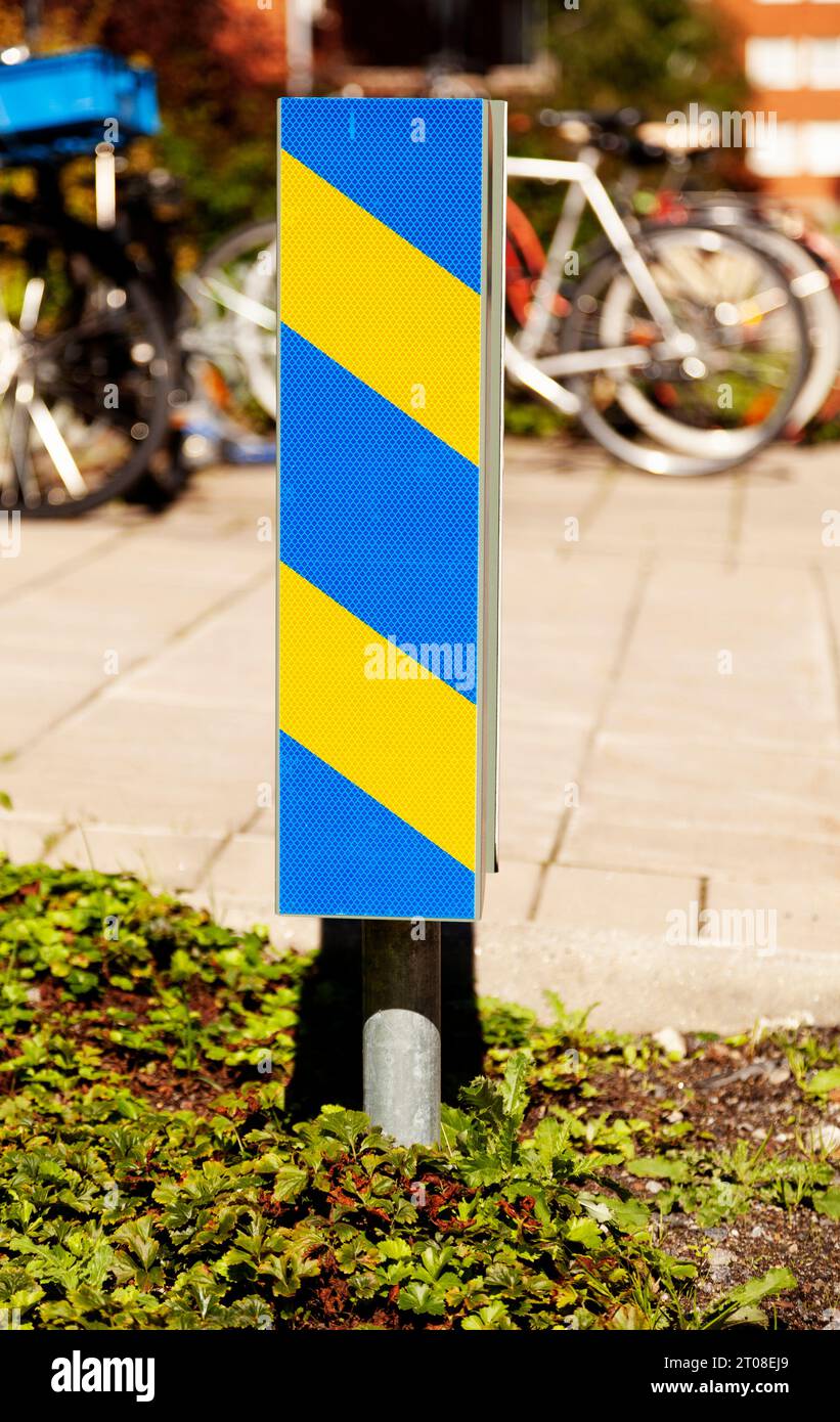 traffic sign that marks on which side you may pass Stock Photo - Alamy