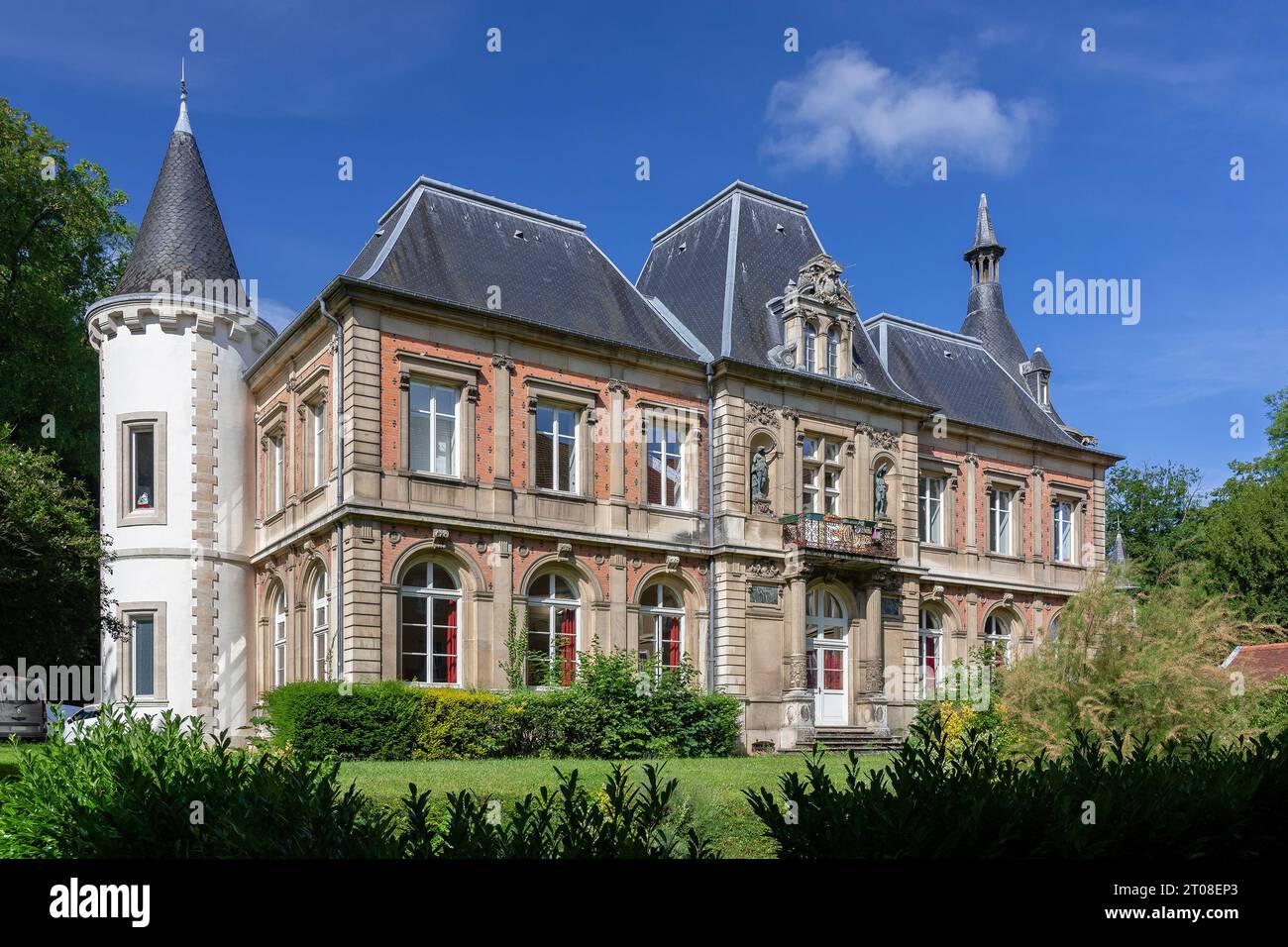 Old Castle of the Asnée in a garden Stock Photo - Alamy