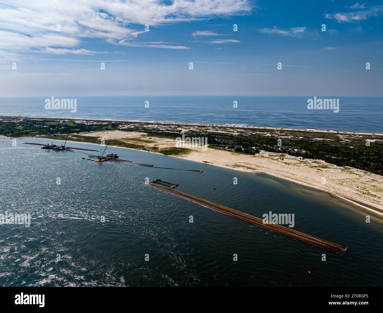 An aerial view of the waters of the Fire Island Inlet on a sunny ...