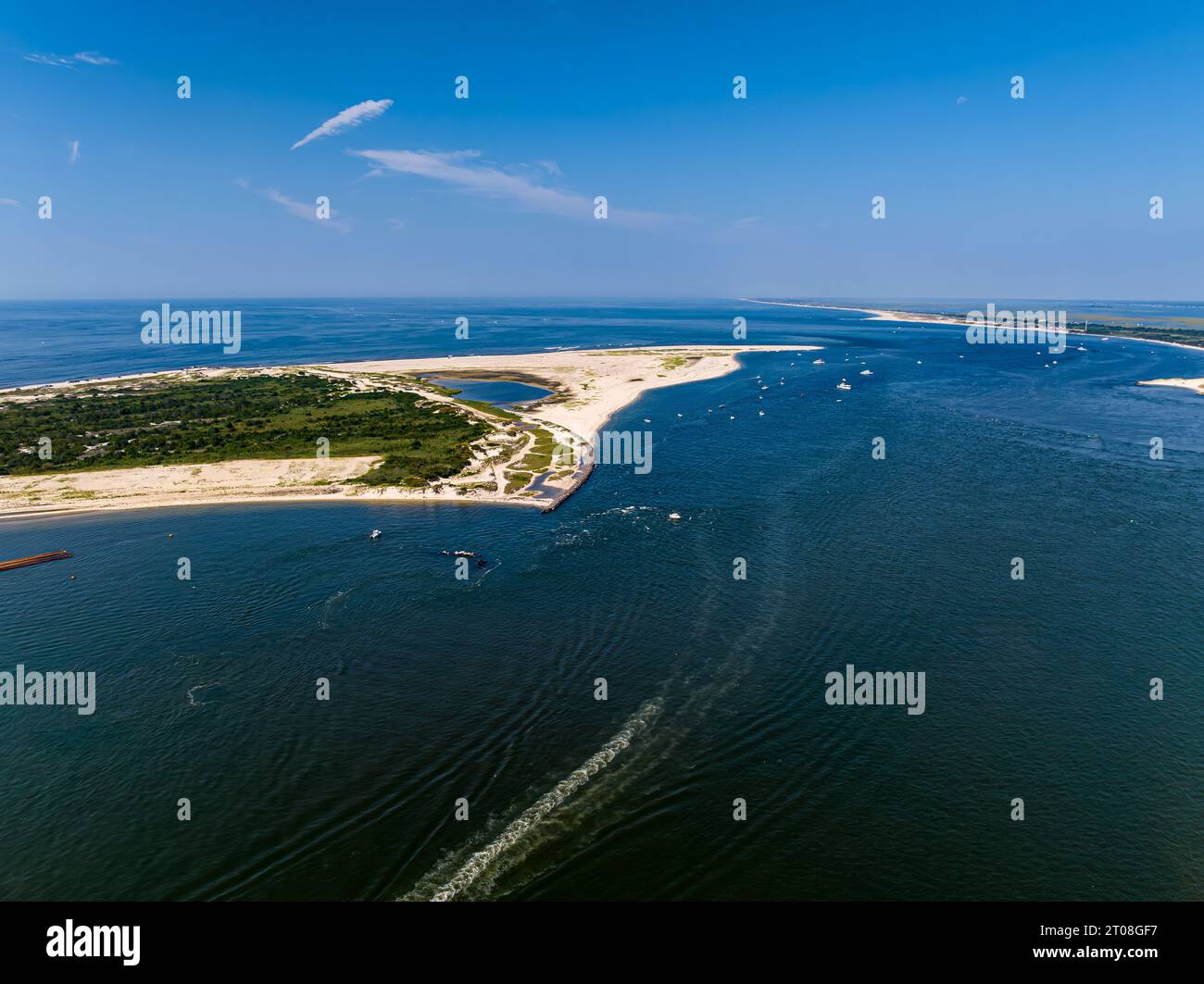 An aerial view of the waters of the Fire Island Inlet on a sunny ...