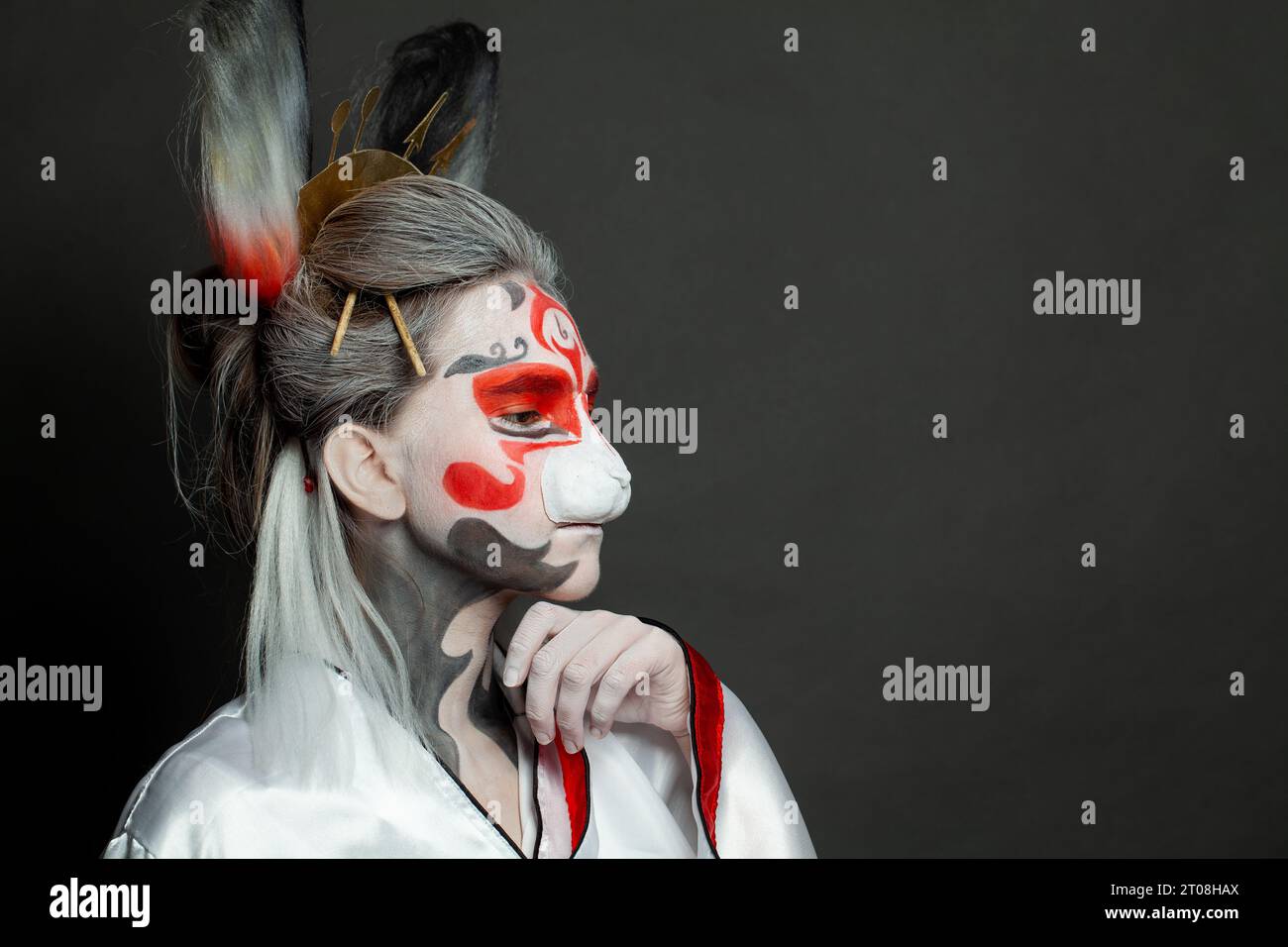 Young woman rabbit portrait. Halloween makeup and costume Stock Photo ...