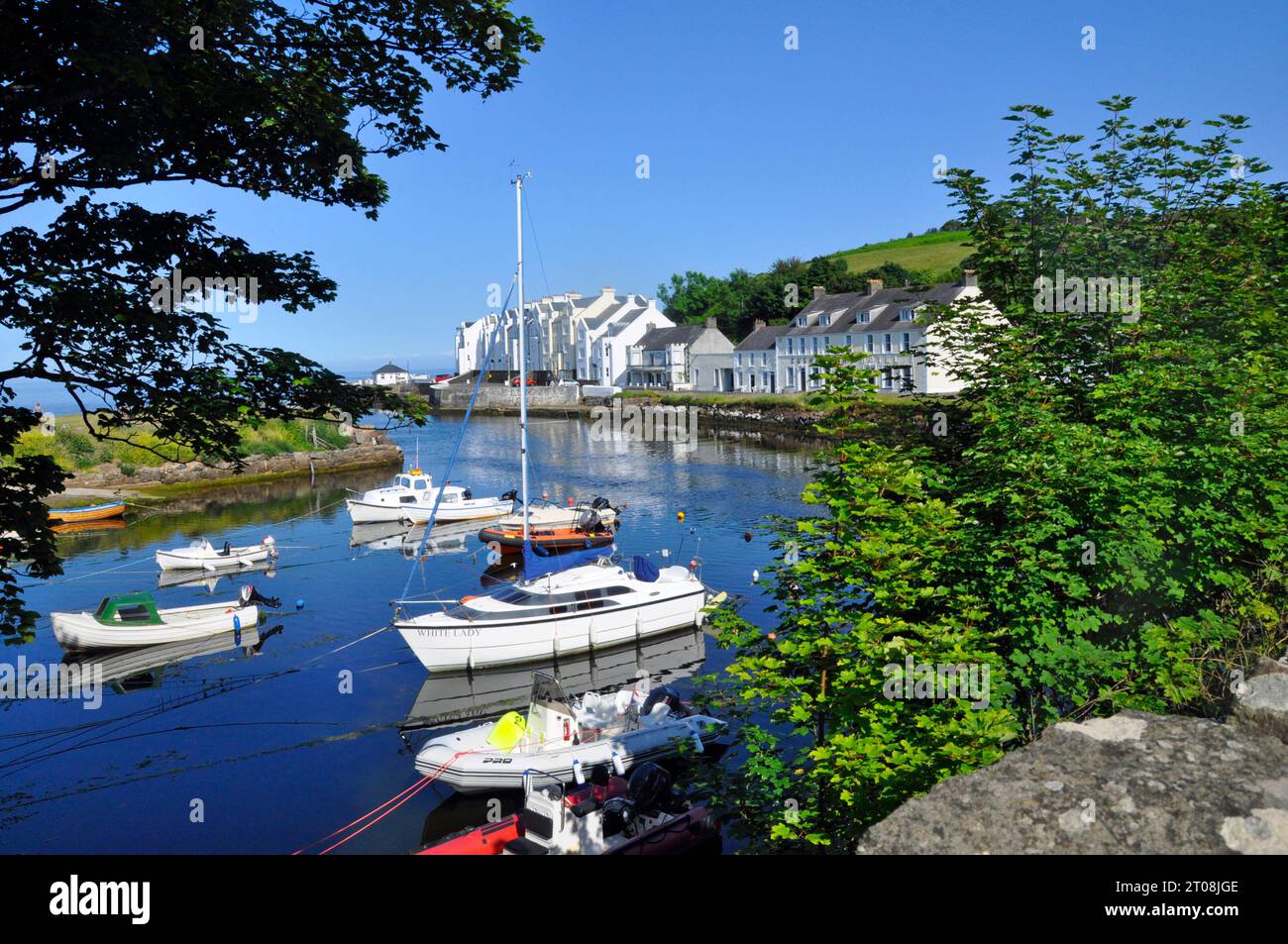 View of the marina in the scenic coastal village of Cushendun in County ...