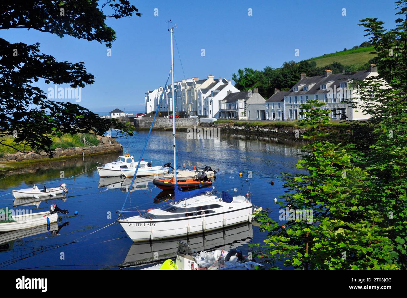 View of the marina in the scenic coastal village of Cushendun in County ...