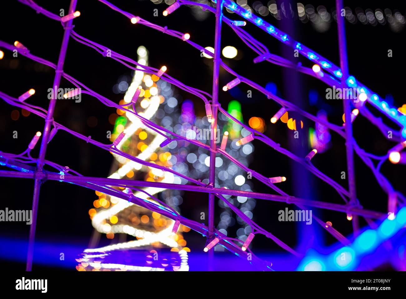 illuminated Christmas-trees. Luminous electric artificial Christmas ...