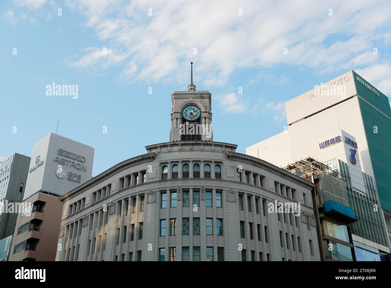 A Mickey Mouse clockface is displayed on the famous clock tower on top ...