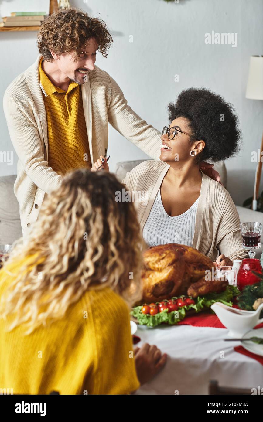 two family members looking and smiling at each other while sharing ...