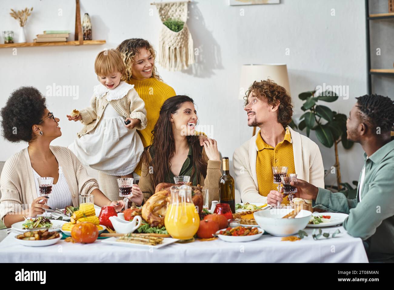 Joyful thanksgiving family feast hi-res stock photography and images ...