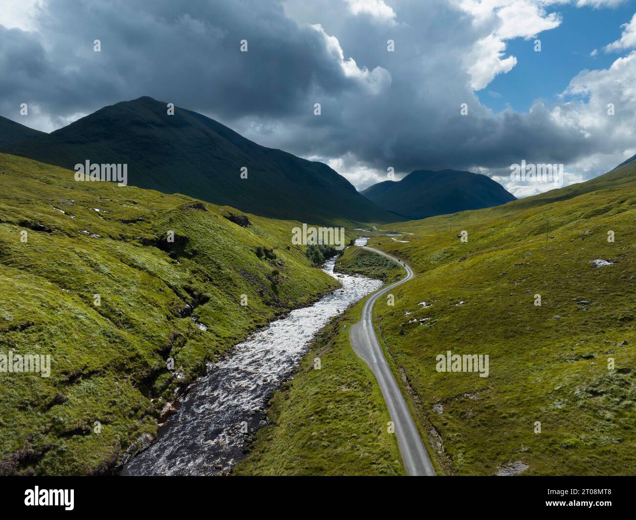 Aerial view of Glen Etive and River Etive, next to it a single track ...