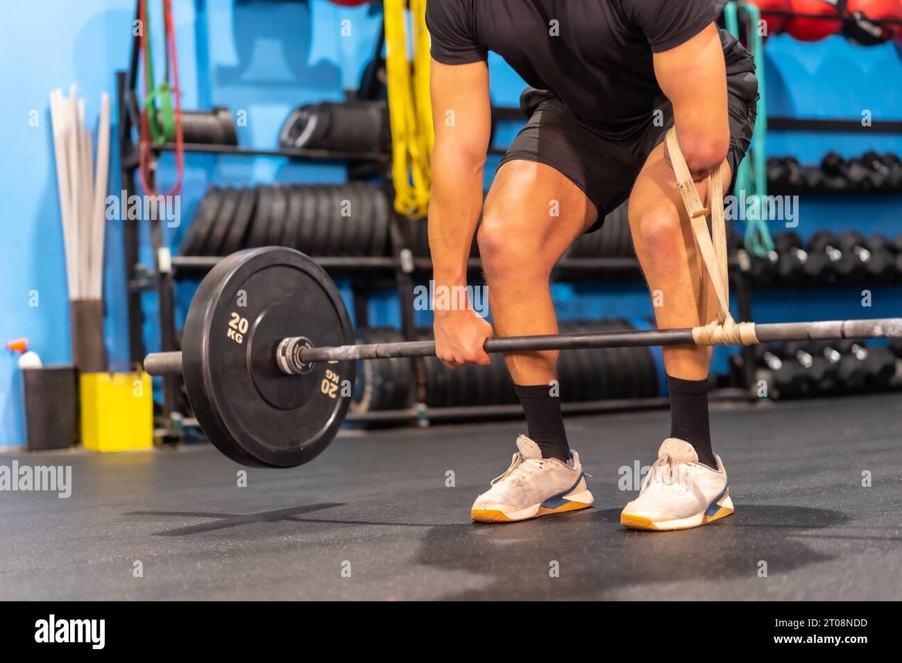 Unrecognizable handicapped man with an arm amputated weight lifting in ...