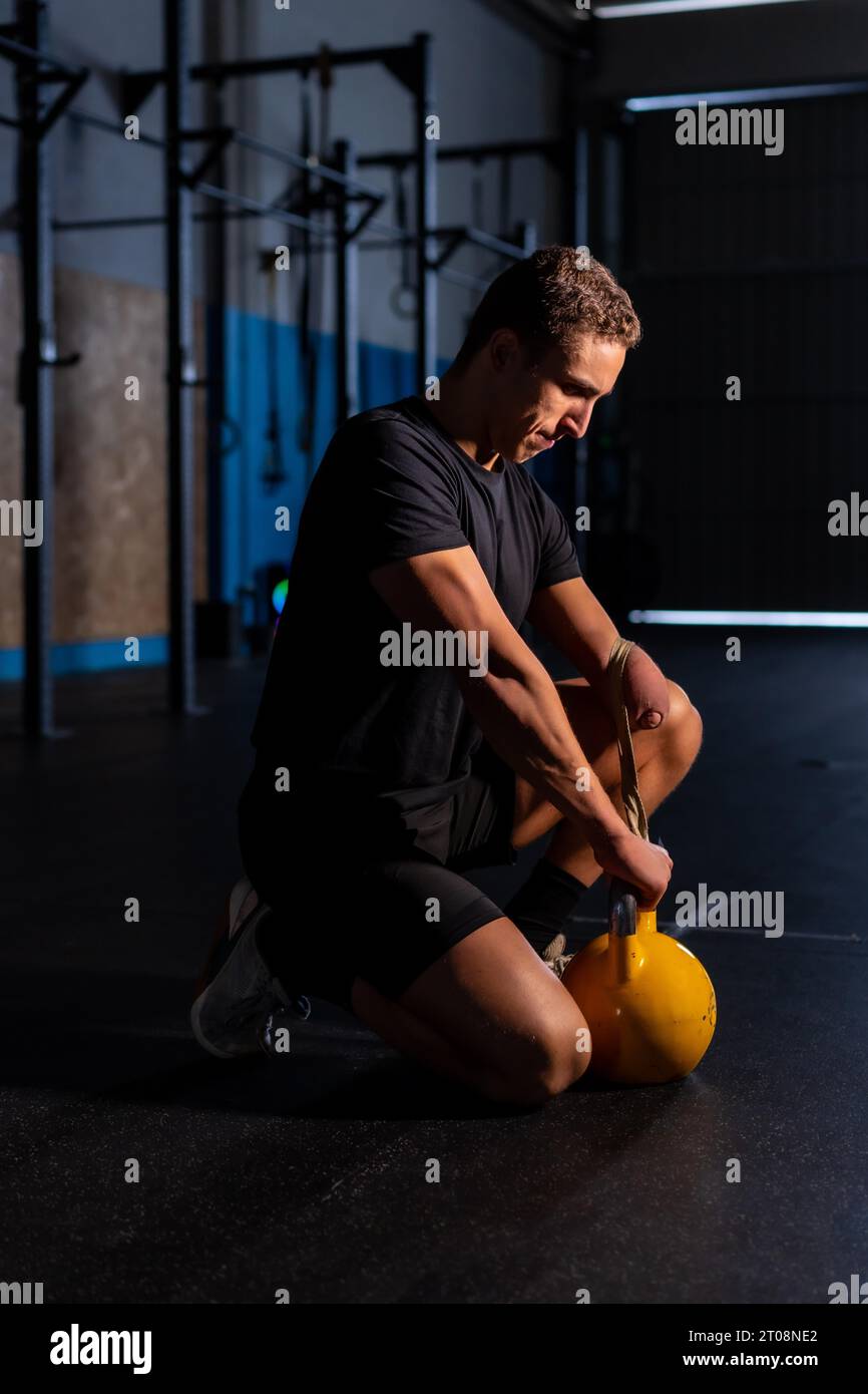Dark and artistic portrait of a strong man with an arm amputated ...