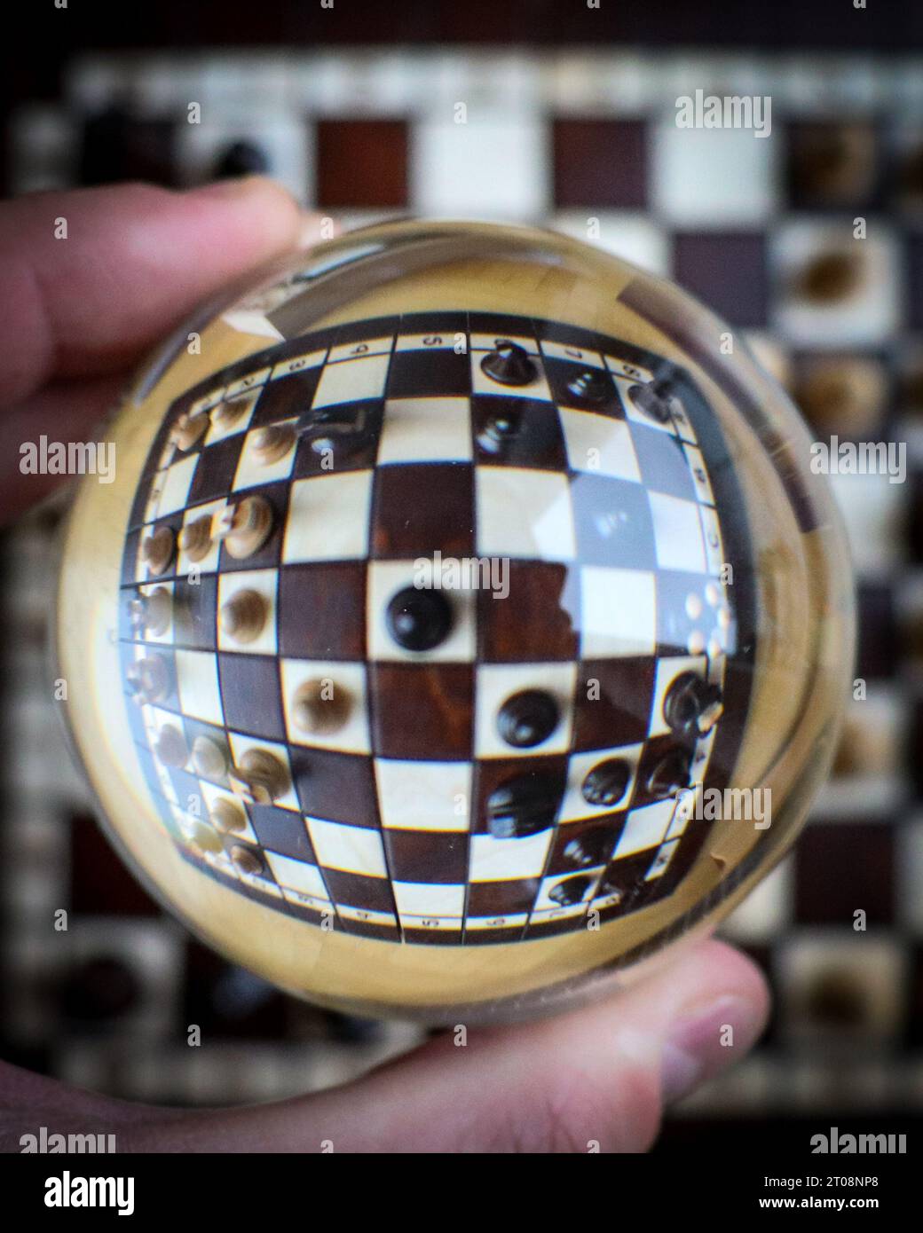 top view of a chess board through a glass ball Stock Photo - Alamy