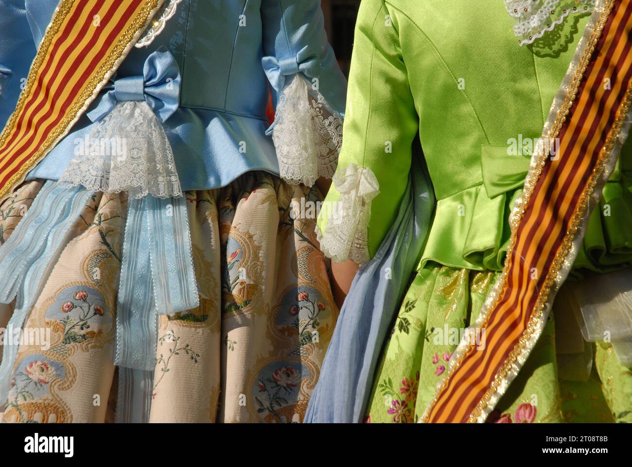 Las Fallas Fiesta, two girls in traditional dress from behind showing ...