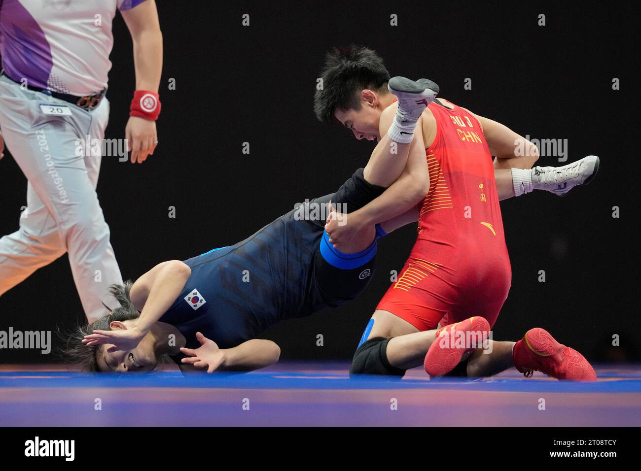 China's Zhu Jiang and South Korea's Cheon Miran compete during their ...