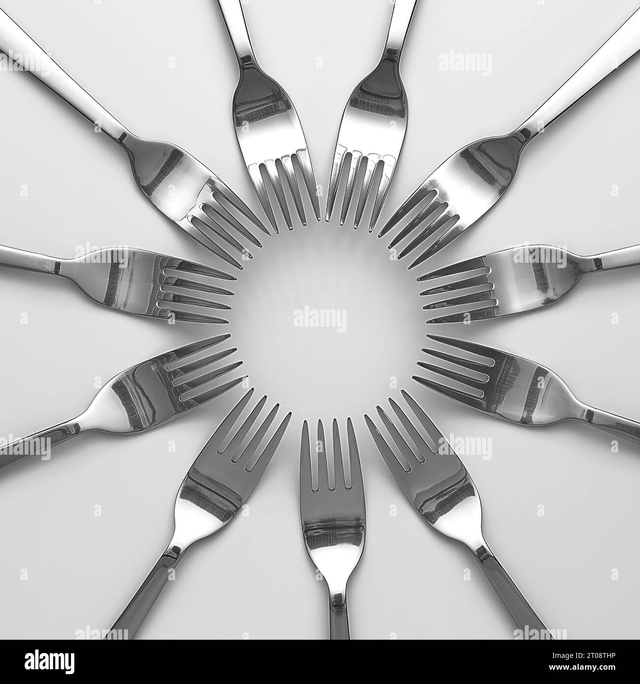 A top view of arranged silver forks Stock Photo - Alamy