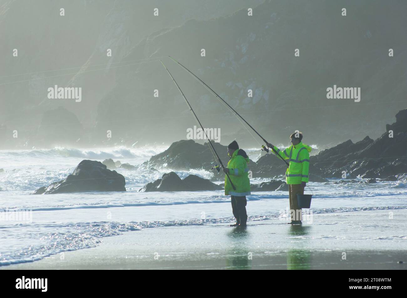 Two fishermen at Kennack Sands, Cornwall, UK - John Gollop Stock Photo ...