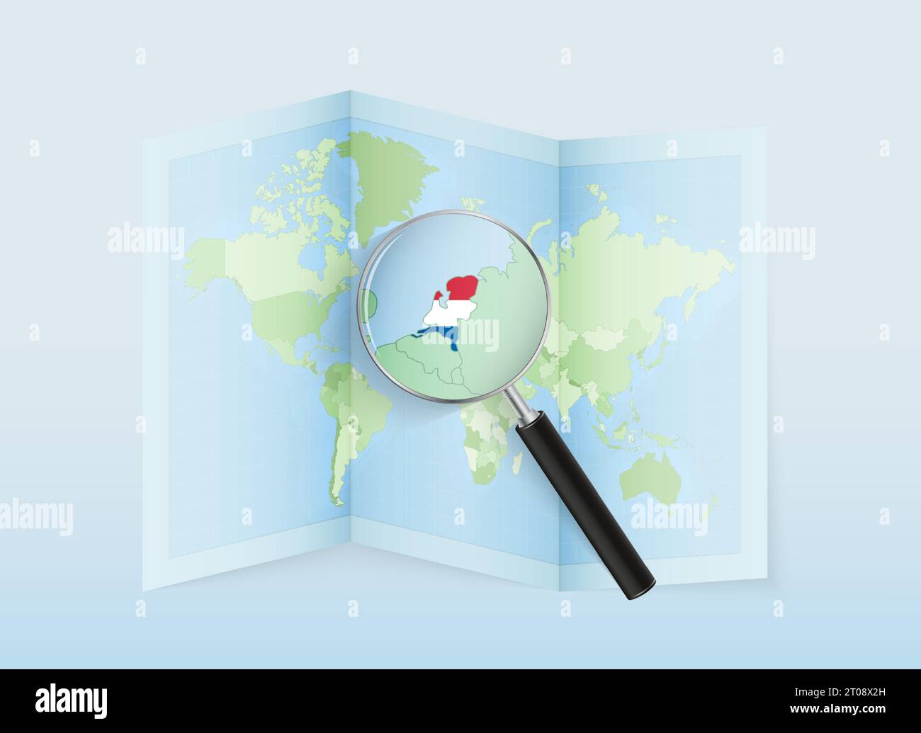 A folded world map with a magnifying lens pointing towards Netherlands ...