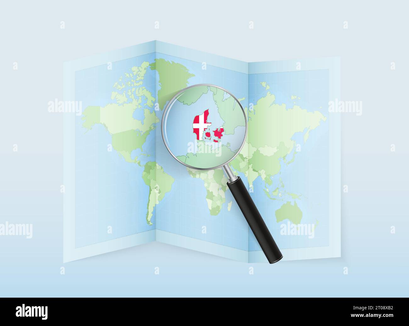 A folded world map with a magnifying lens pointing towards Denmark. Map ...