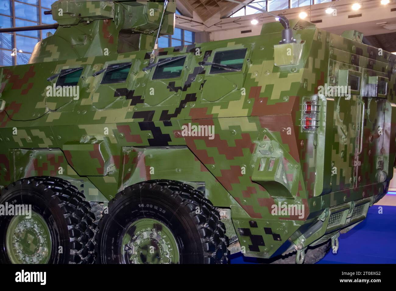 Armored combat vehicle painted in camouflage colors, armed with lethal ...