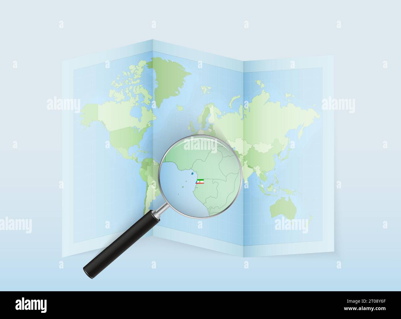 A folded world map with a magnifying lens pointing towards Equatorial ...