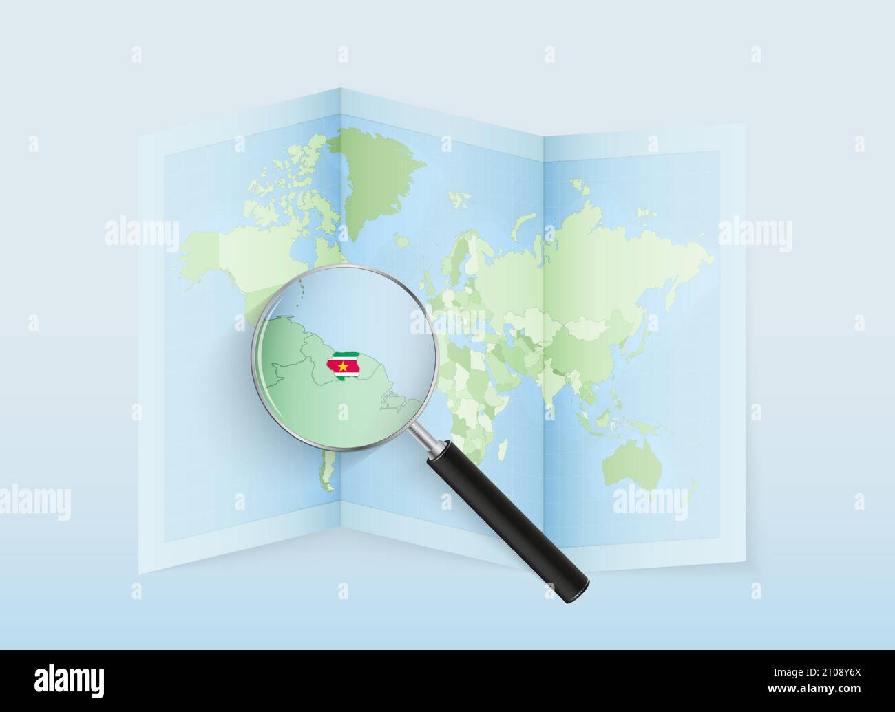 A folded world map with a magnifying lens pointing towards Suriname ...