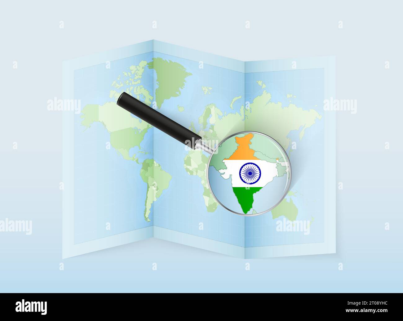A folded world map with a magnifying lens pointing towards India. Map ...