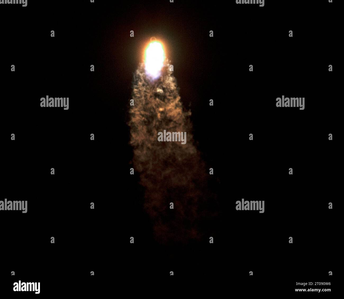 The SpaceX Falcon 9 rocket creates a contrail as it launches an ...