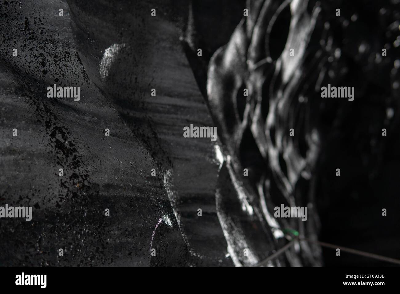 Close up shot of the ice texture of an ice cave in Iceland. We can see ...