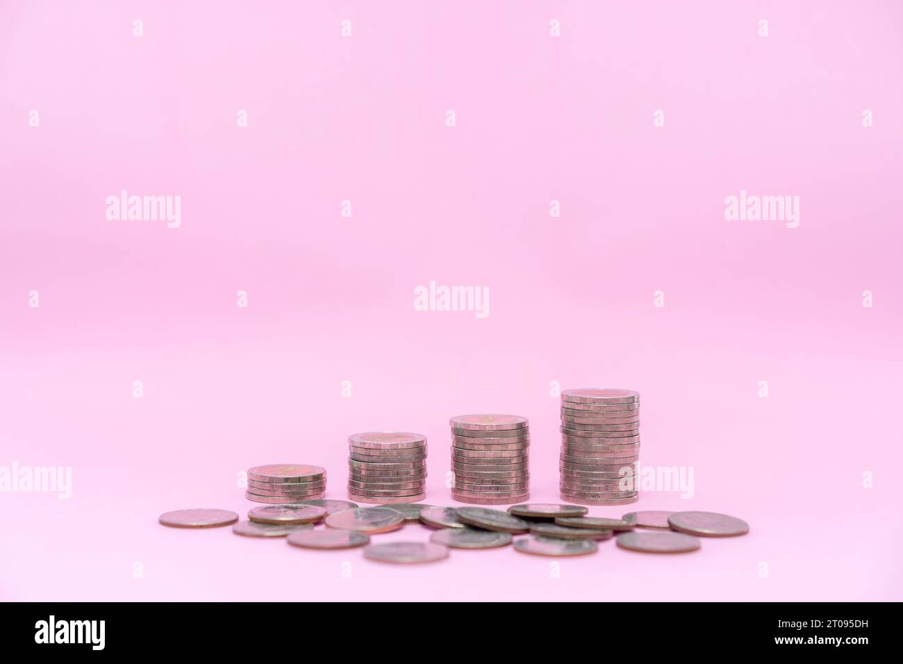 money stack on pink background, saving money concept Stock Photo - Alamy