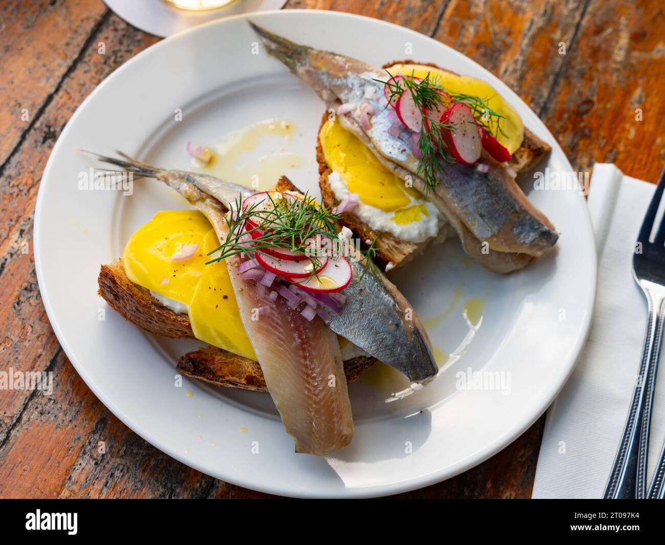 Traditional dish of Dutch cuisine is Haring Stock Photo - Alamy