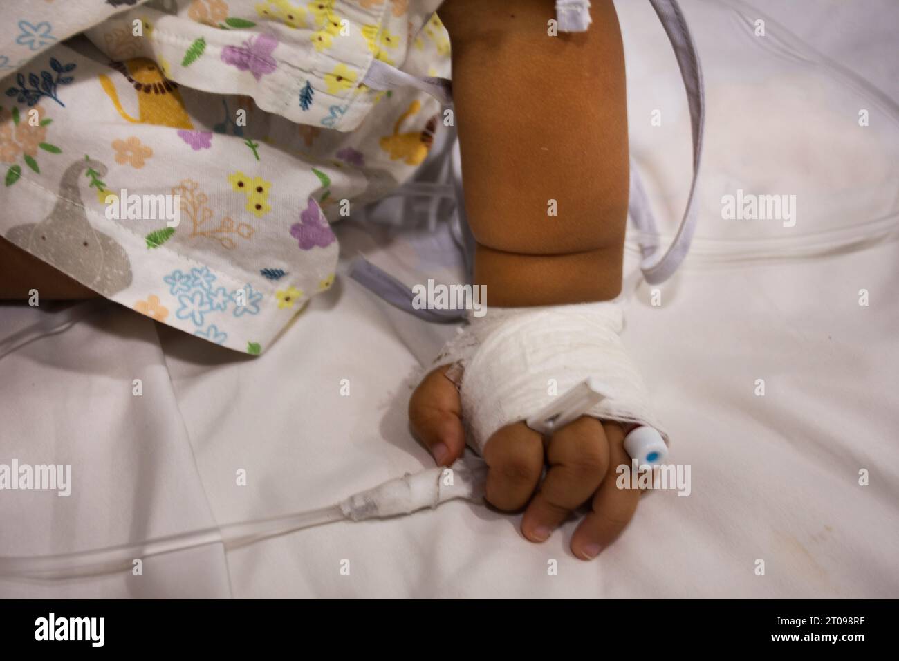 Doctor and nurse use giving saline solution medicine intravenous ...