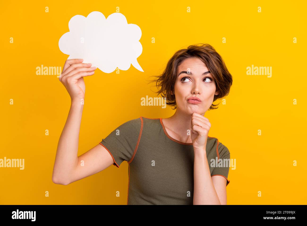 Photo of ponder pensive girl with bob hairstyle dressed khaki t-shirt ...