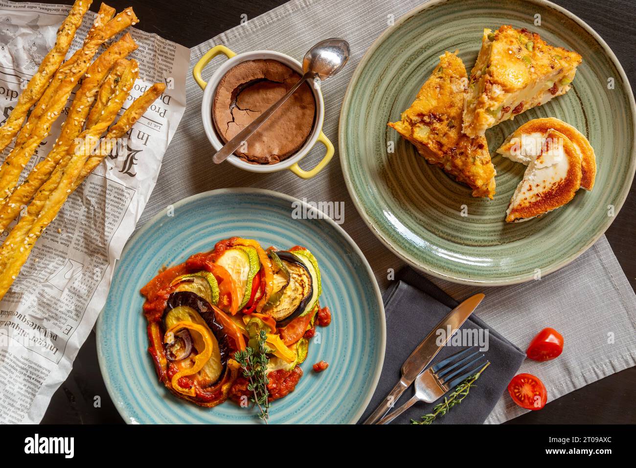 Well arranged restaurant table with french cuisine dishes Stock Photo ...