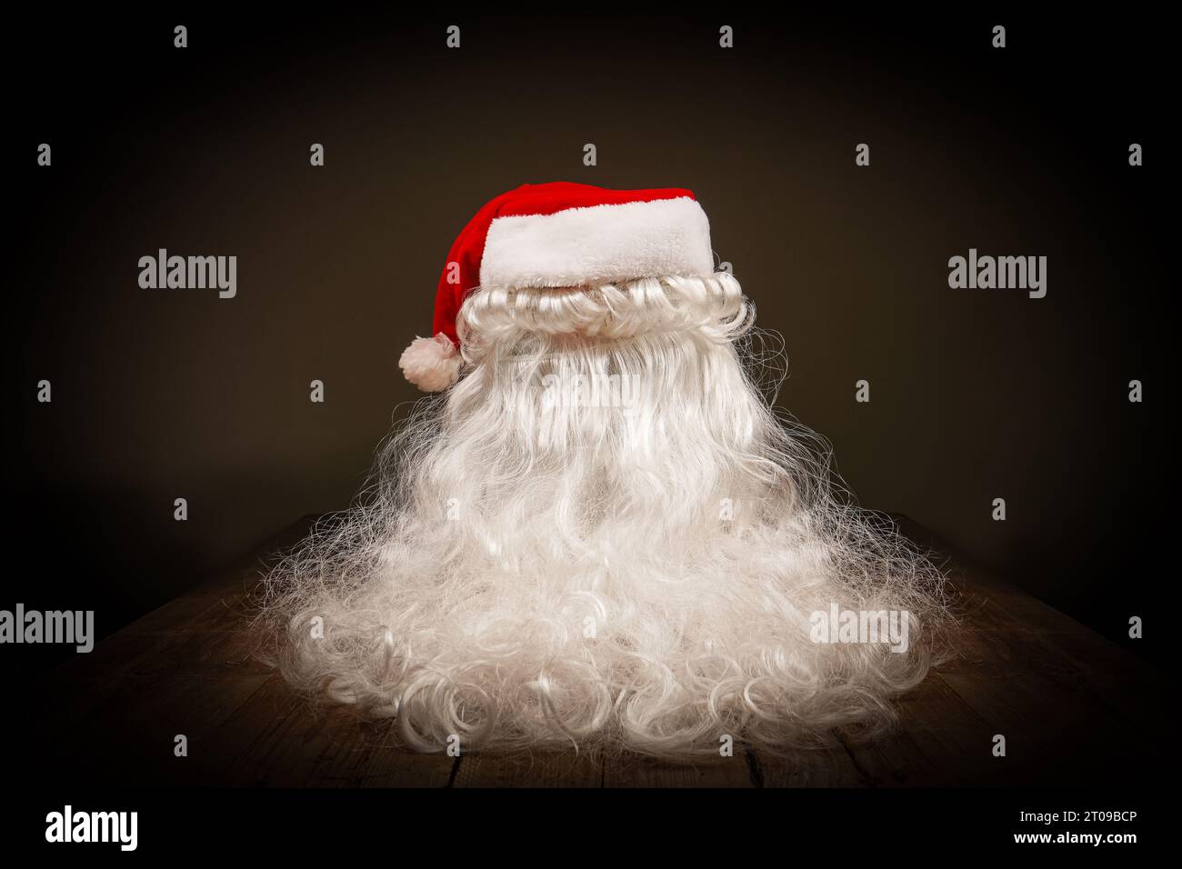 Santa hat and beard on a wooden background. Symbolism of New Year's ...