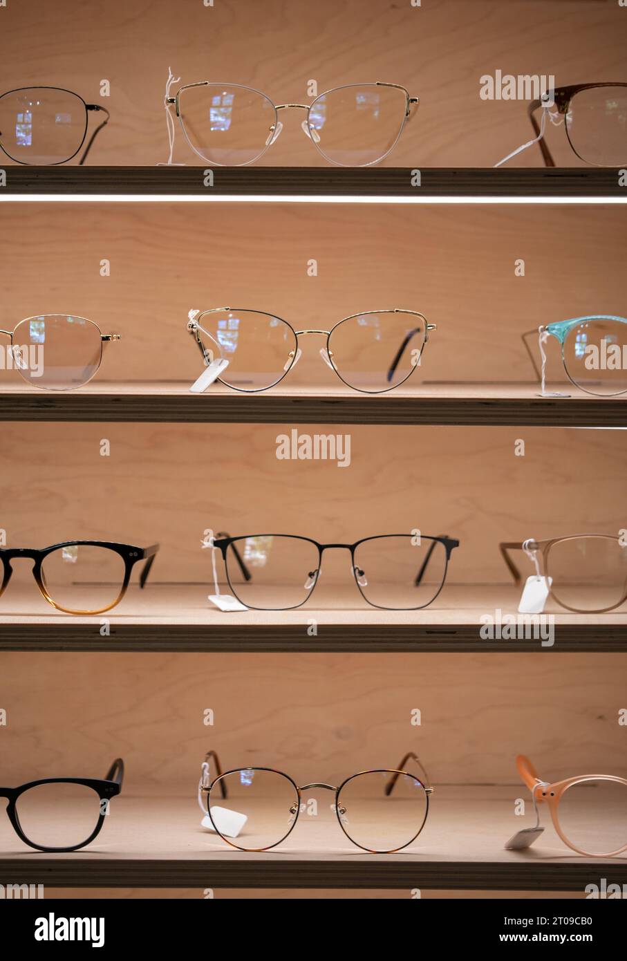 inside optical shop. shelf with a few eyeglasses Stock Photo - Alamy