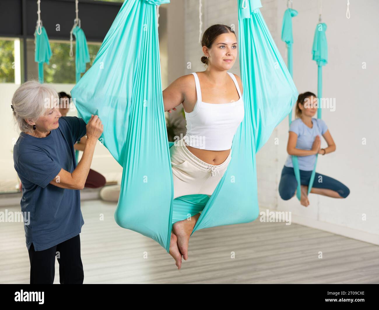 Aerial yoga teacher hi-res stock photography and images - Alamy