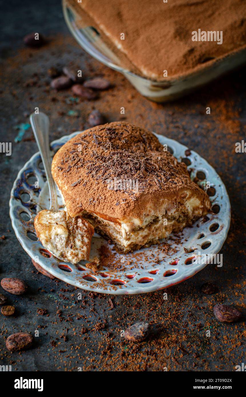 Traditional Italian Tiramisu cake powdered with cocoa Stock Photo - Alamy