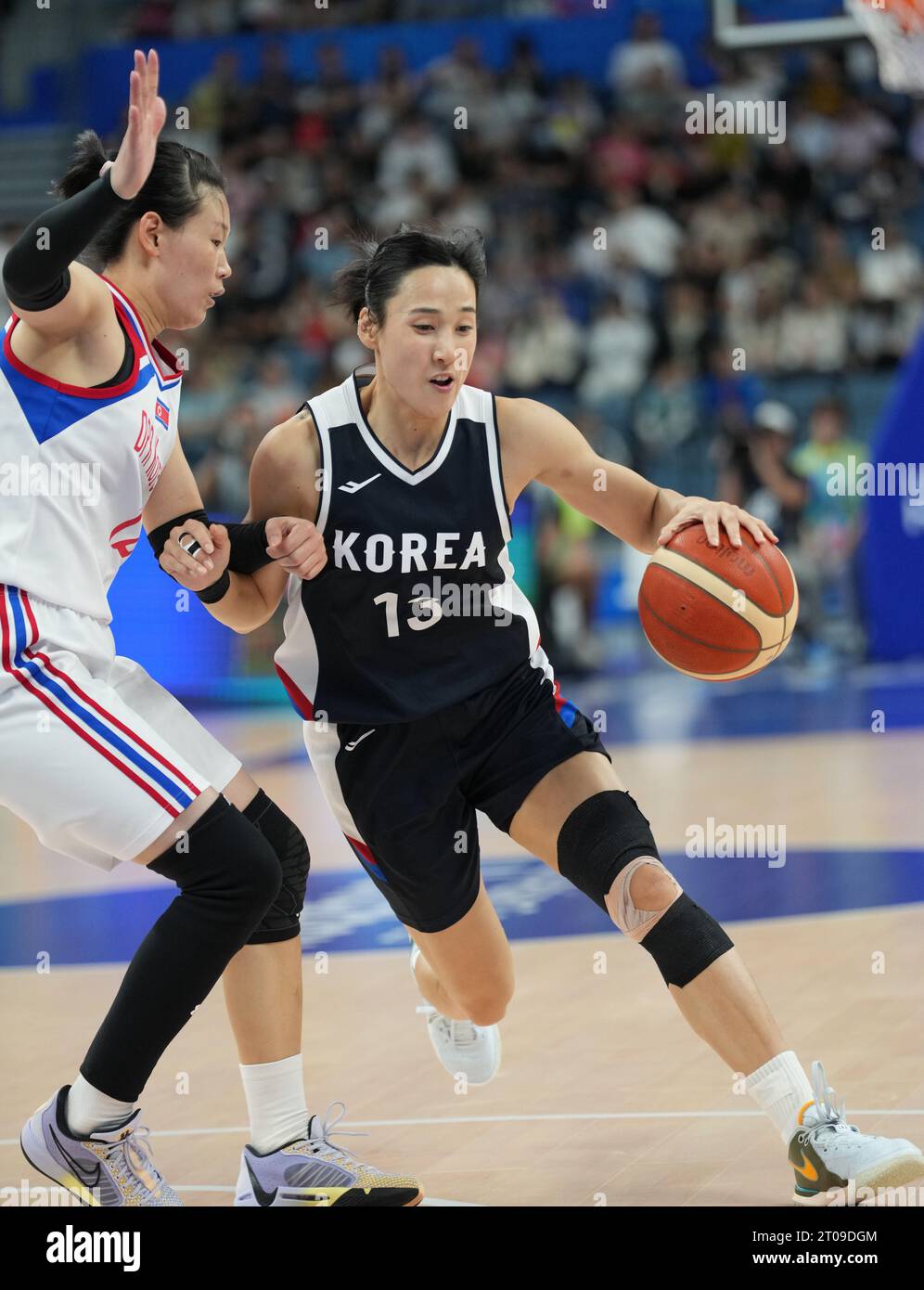 Hangzhou, China's Zhejiang Province. 5th Oct, 2023. Kim Danbi (R) of ...