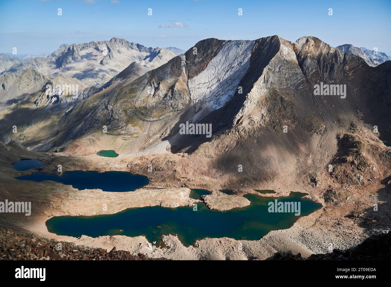 From above scenic view of calm lake surrounded by Picos del Infierno ...