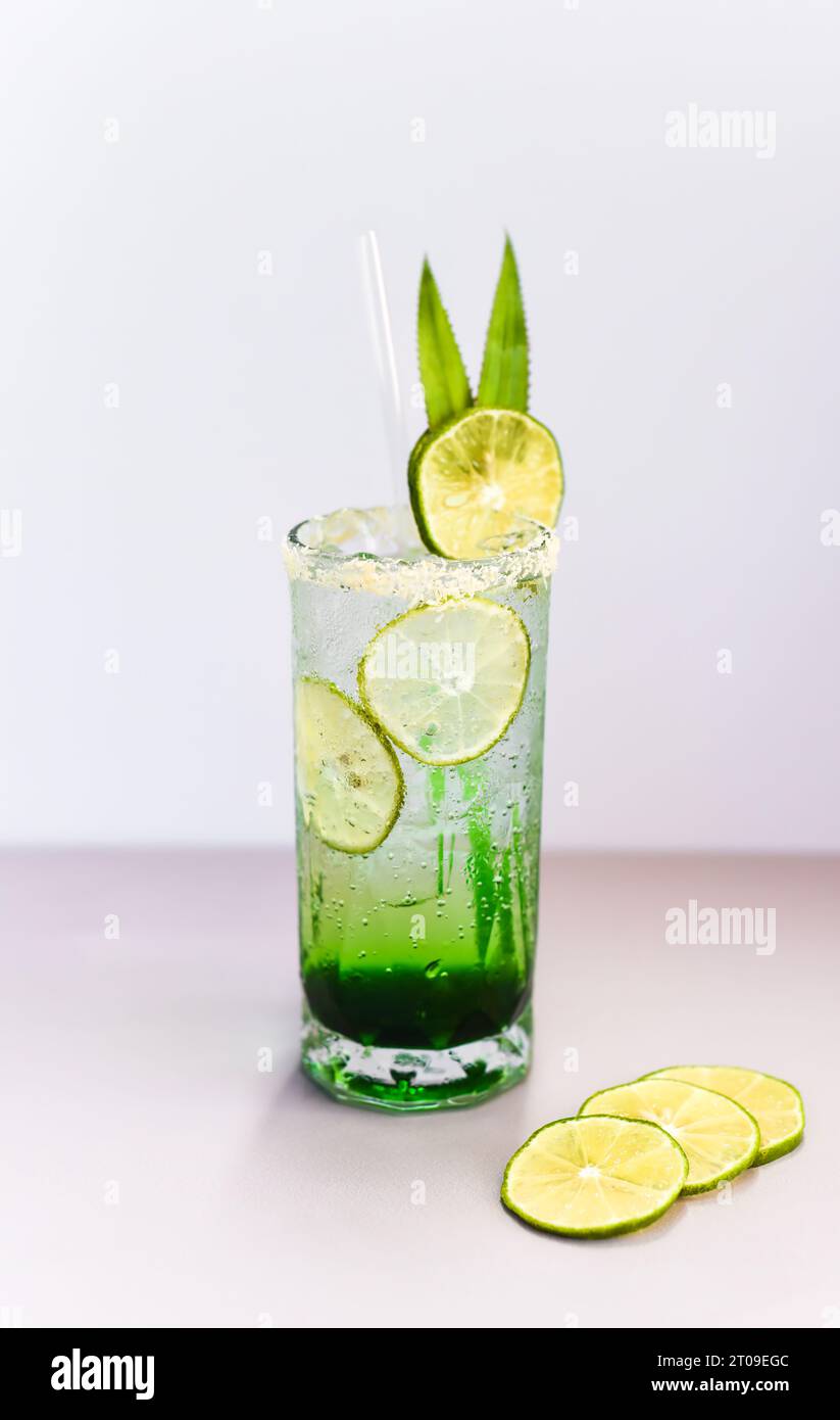 Panda leaves lemonade with desiccated coconut and green syrup on light ...