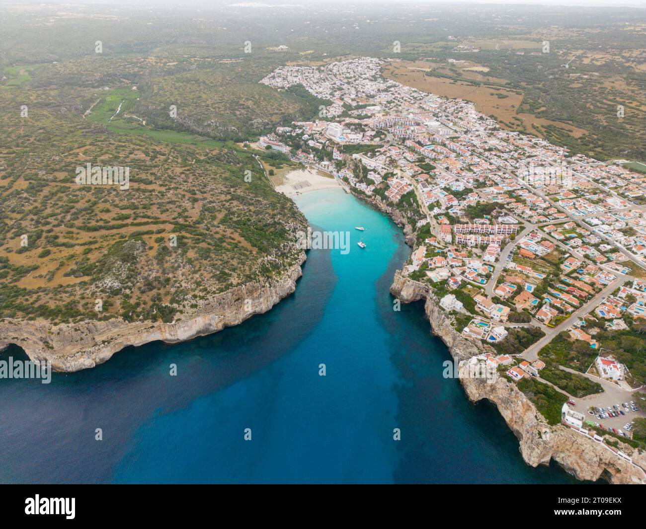 From above drone view of amazing turquoise lagoon Menorca island ...