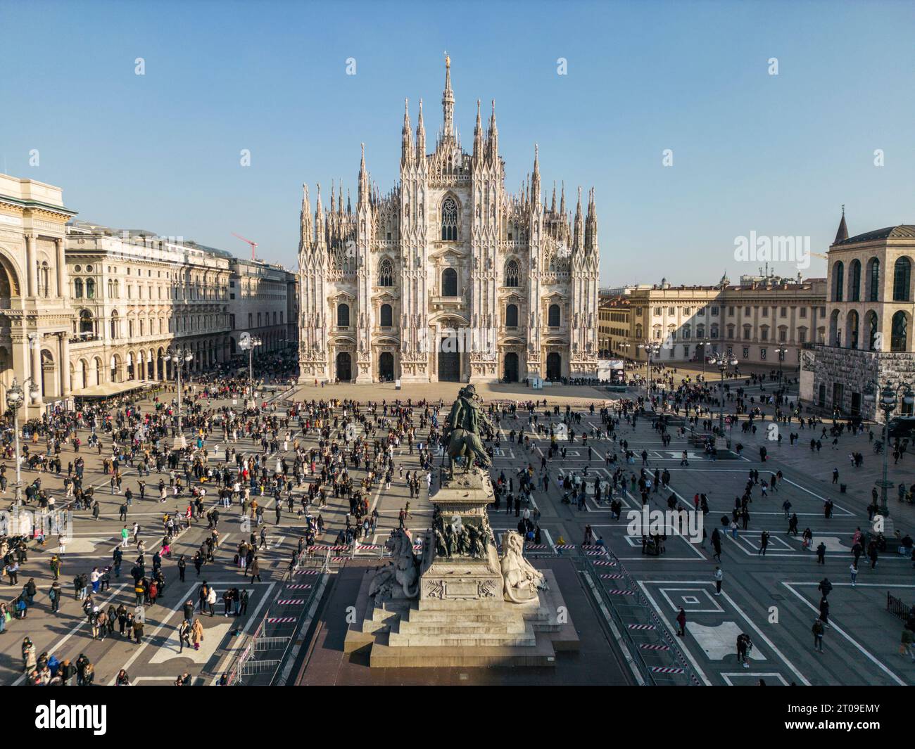 Aerial view of Milan with crowd near old buildings and Metropolitan ...