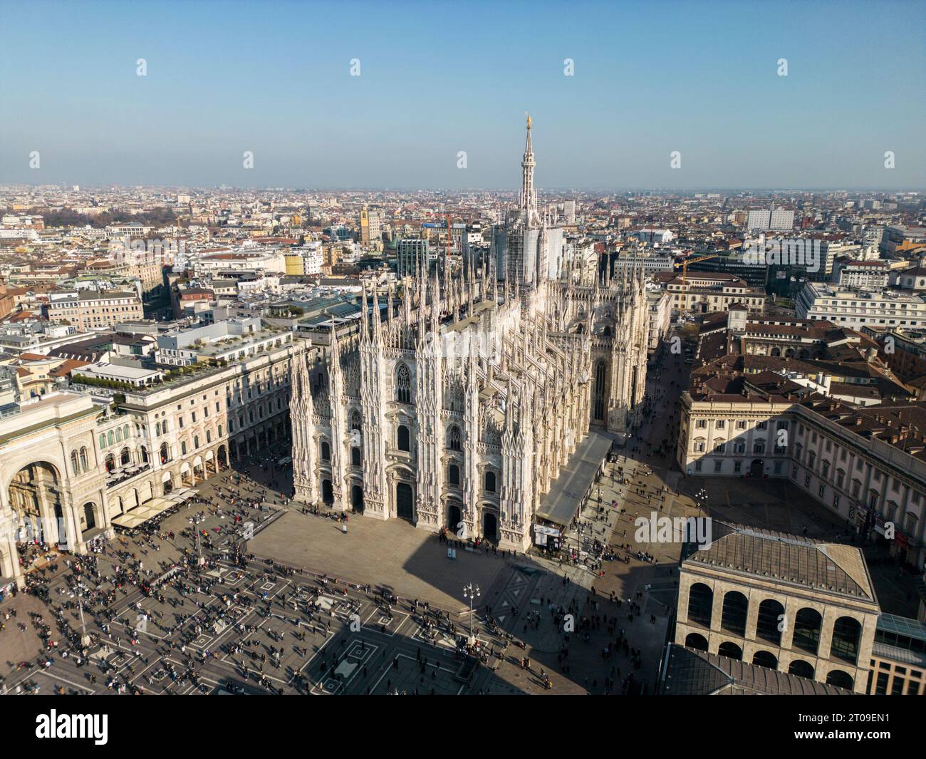 Aerial view of Milan with crowd near old buildings and Metropolitan ...