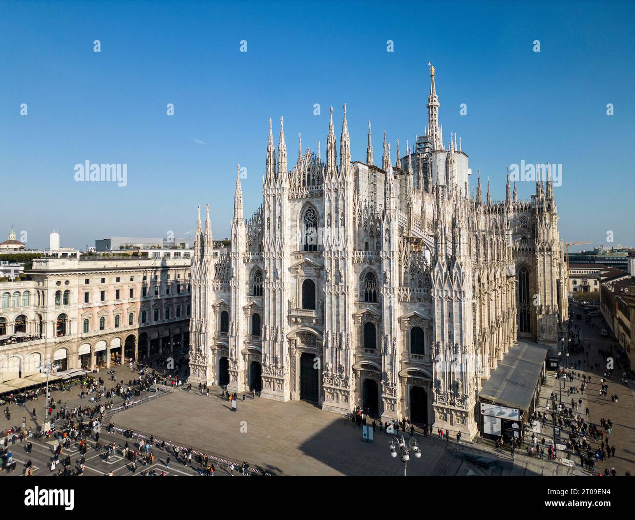 Aerial view of Milan with crowd near old buildings and Metropolitan ...