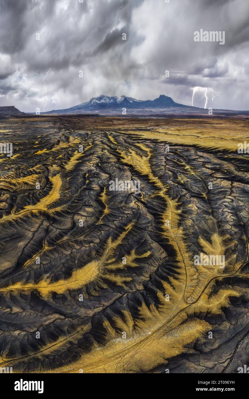 Amazing drone view of Factory Butte summit located in sandstone terrain ...