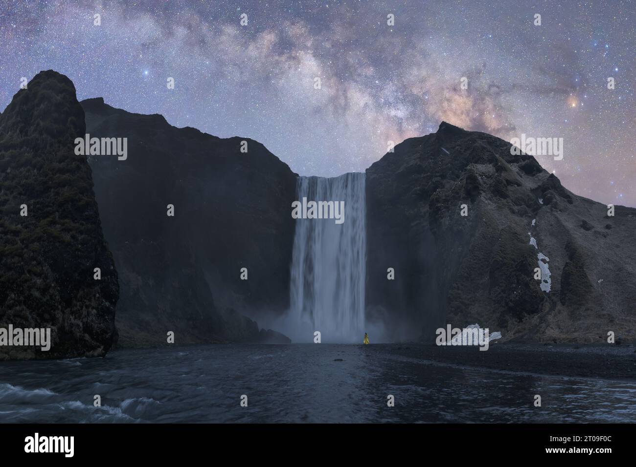 Breathtaking view of magnificent waterfall and rough cliff under ...
