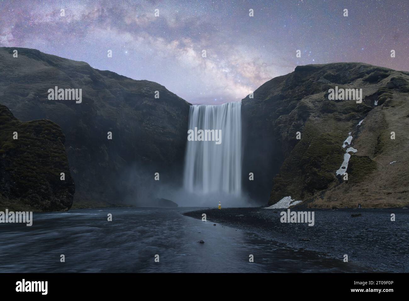 Breathtaking view of magnificent waterfall and rough cliff under ...