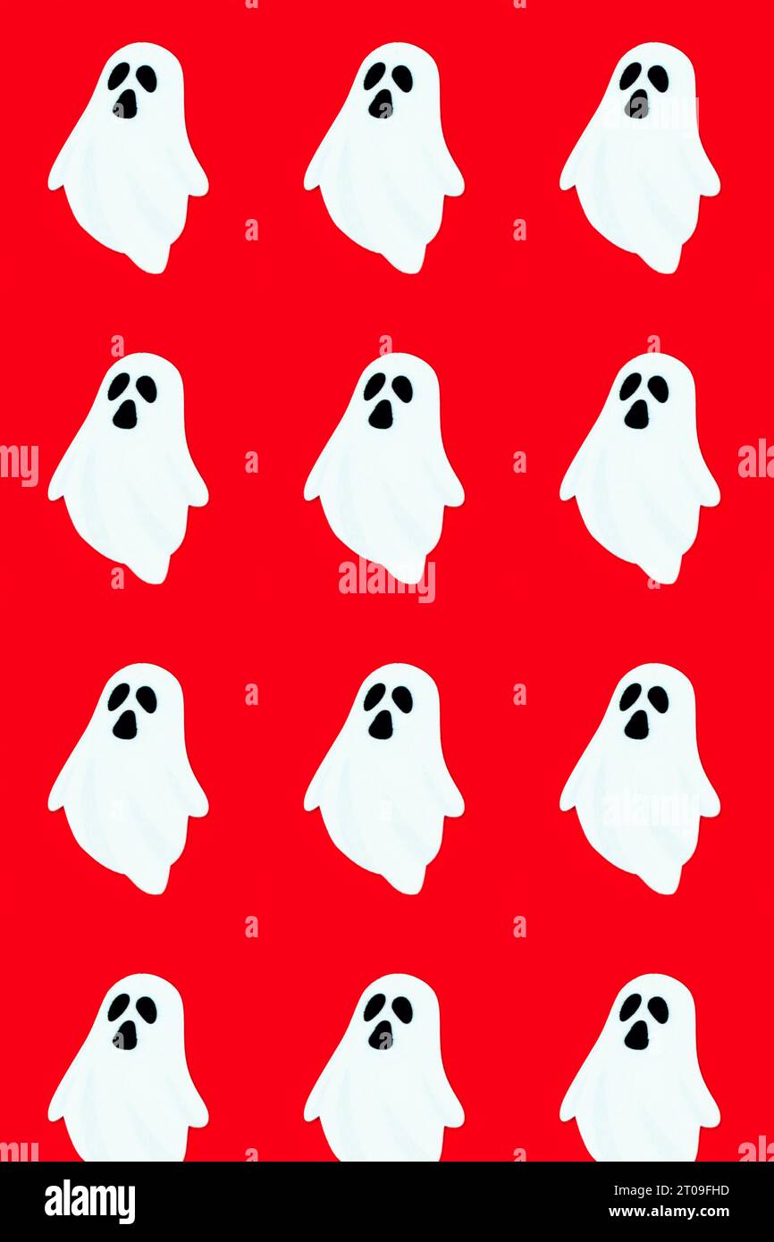 Seamless vector illustration of smiling cartoon ghosts placed in ...